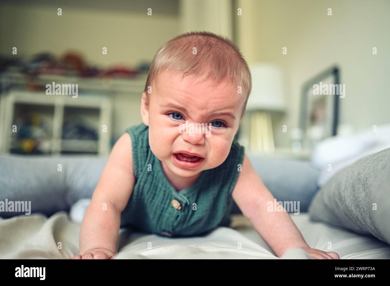 Close up portrait of little funny cute blonde infant boy child toddler ...
