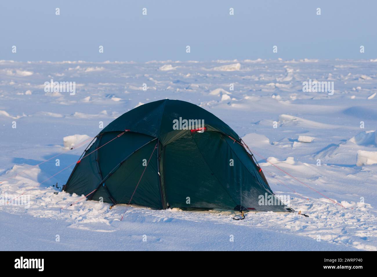 Photographer Steven Kazlowski with camera tripod and Hilleberg tent ...