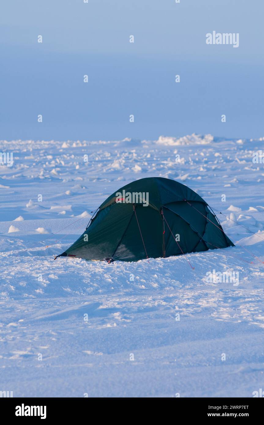 Photographer Steven Kazlowski with camera tripod and Hilleberg tent ...