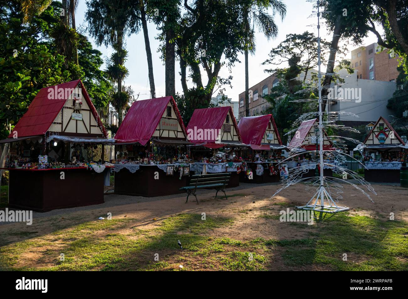 Many colorful souvenir stalls with lots of craftwork items for sale ...