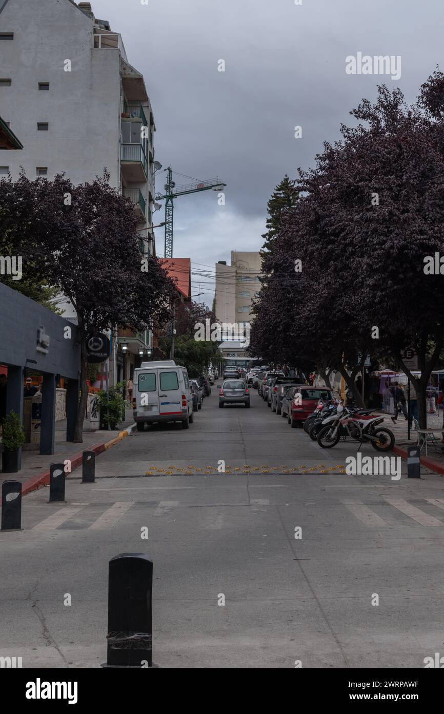 Vertical view of an urban street during a cloudy day Stock Photo - Alamy