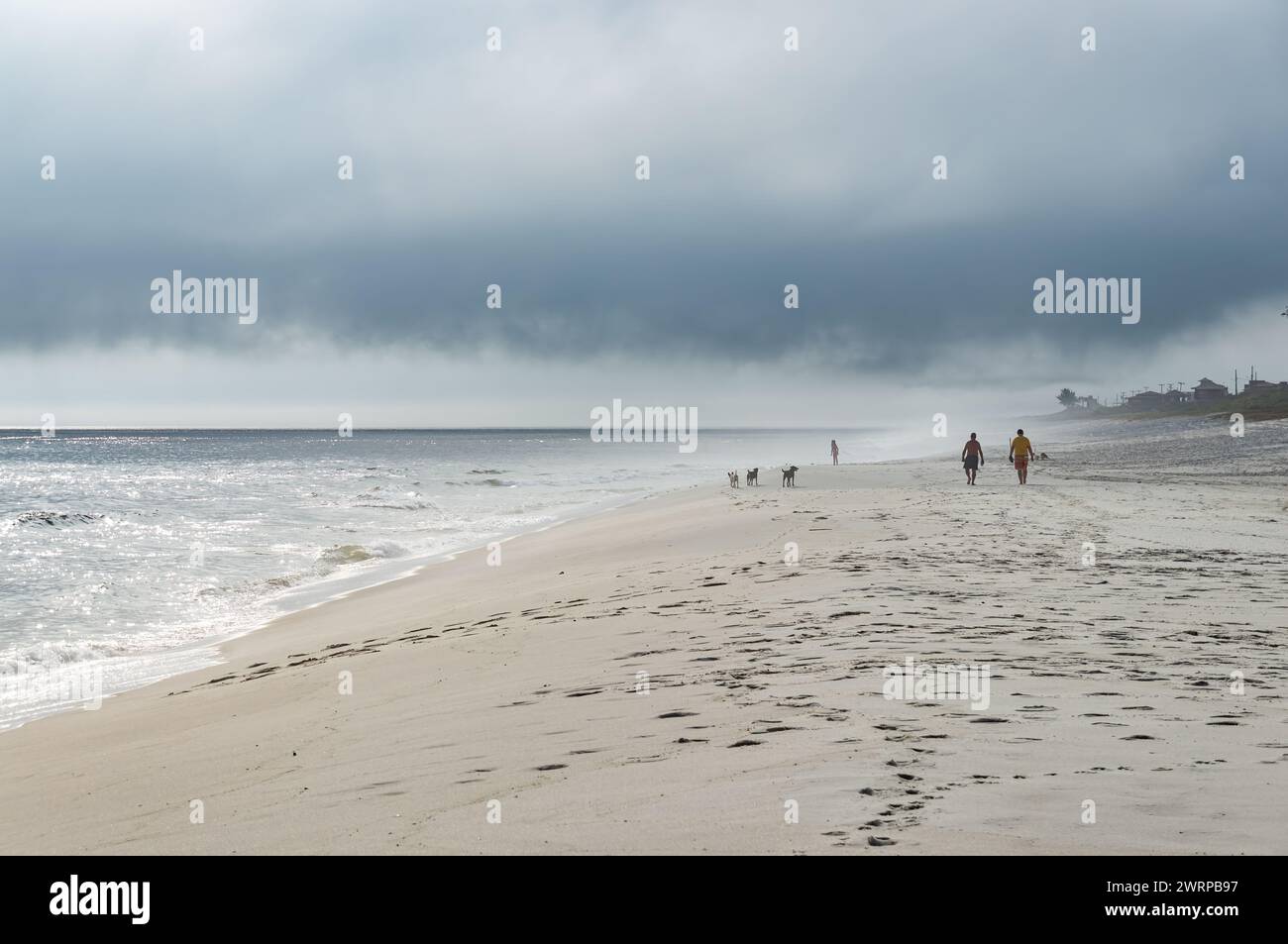 Calm atlantic ocean blue waters hitting the white sands of the empty ...