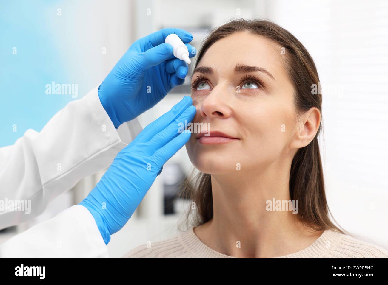 Doctor eye drops hi-res stock photography and images - Alamy