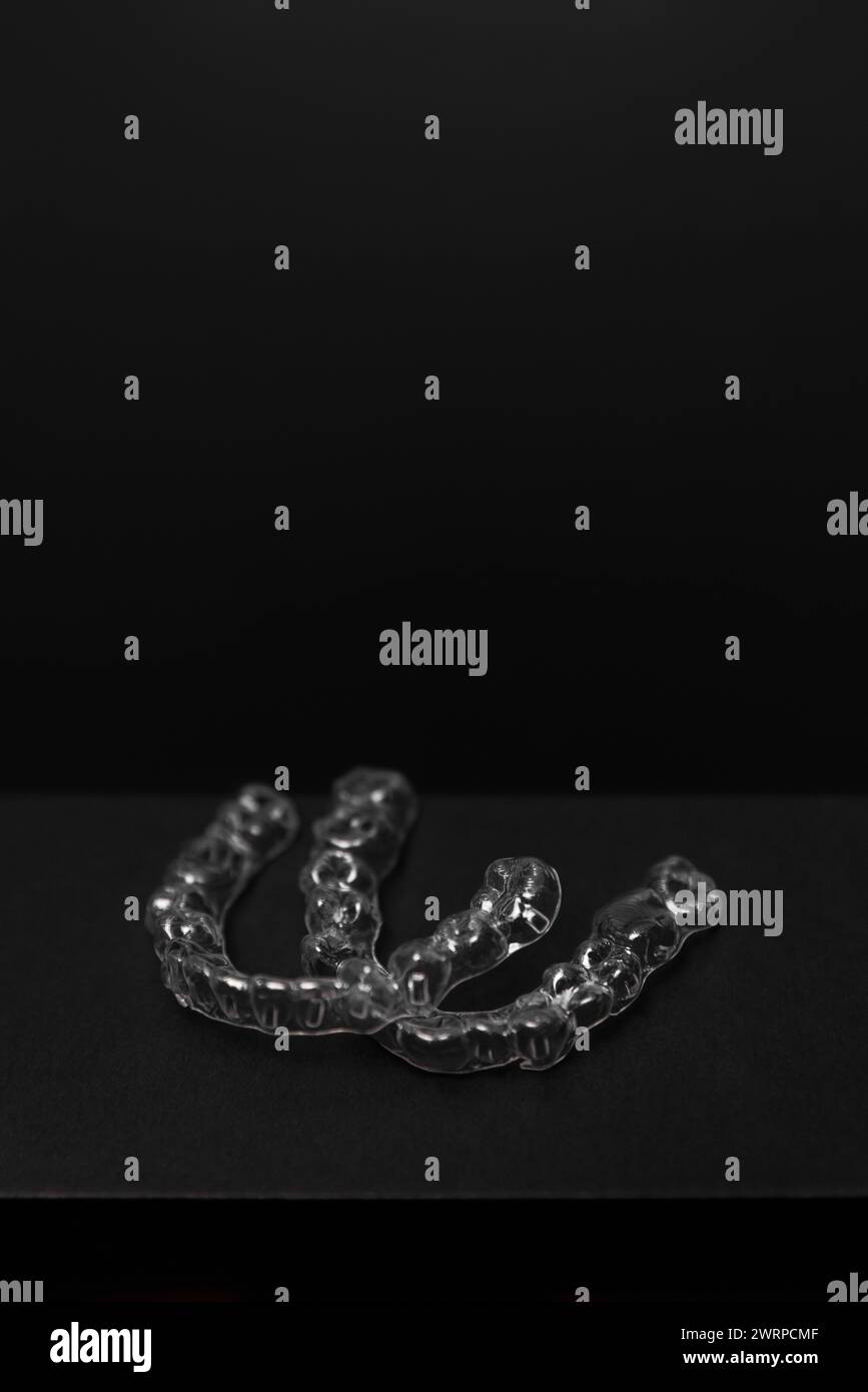 Invisible orthodontics cosmetic brackets on gradient background, tooth ...