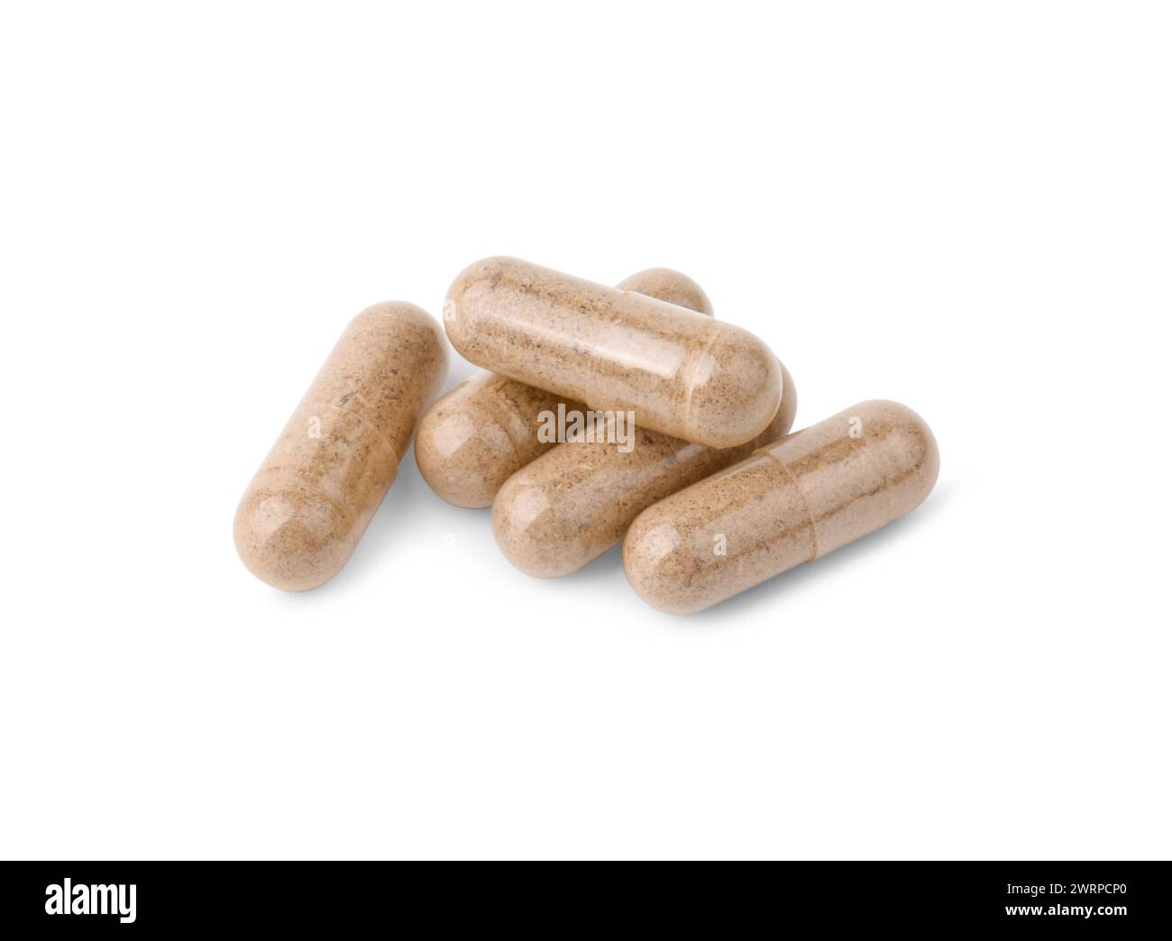 Pile of vitamin capsules isolated on white Stock Photo - Alamy