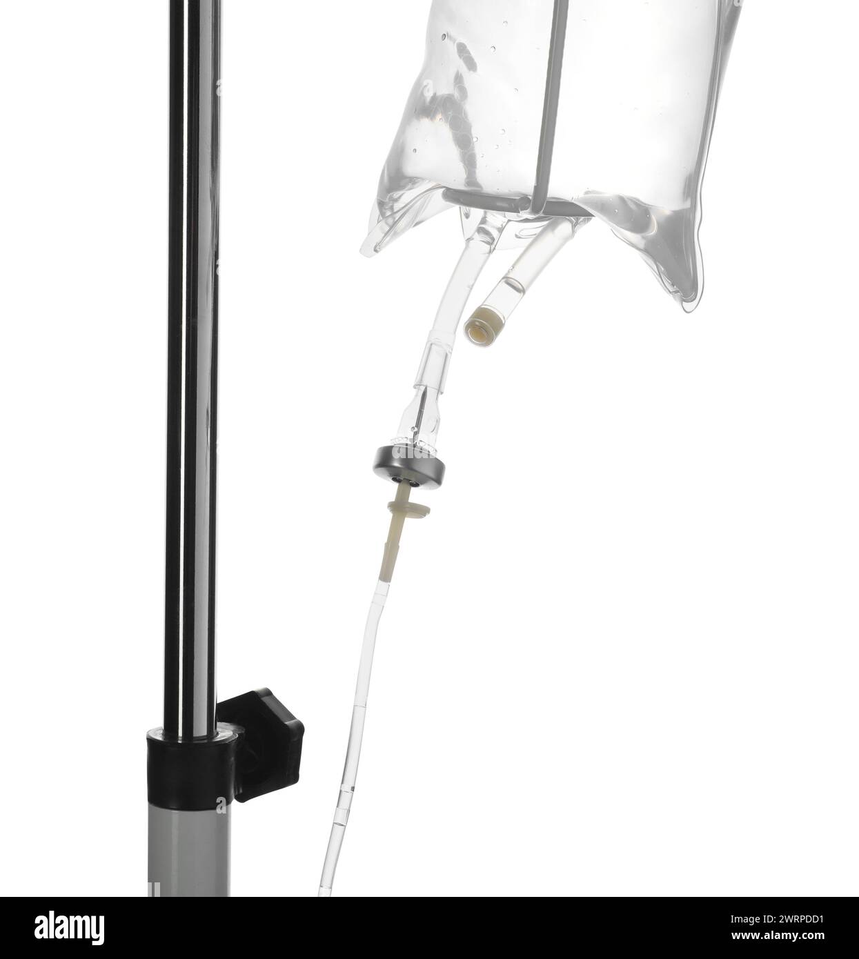 IV infusion set on pole against white background Stock Photo - Alamy