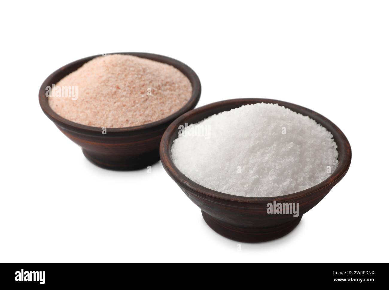 Different types of natural salt in bowls isolated on white Stock Photo ...
