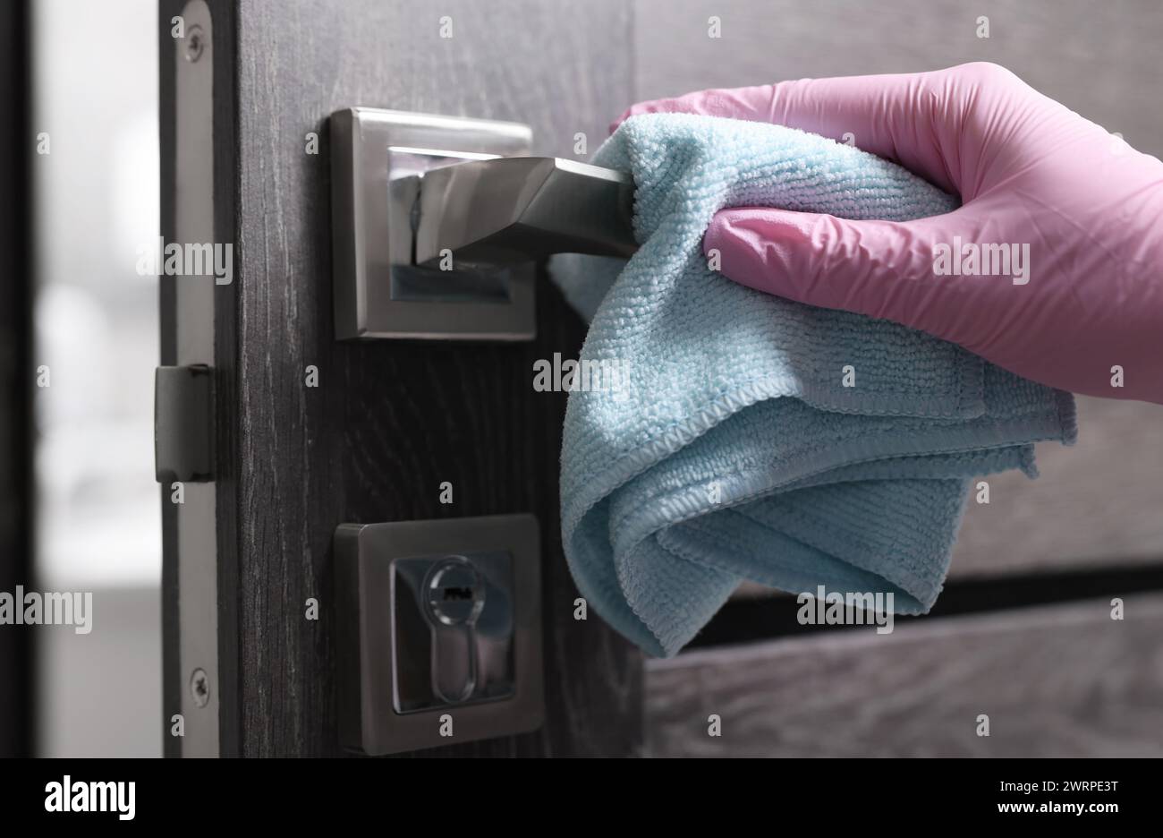 Woman on a doorhandle hi-res stock photography and images - Alamy