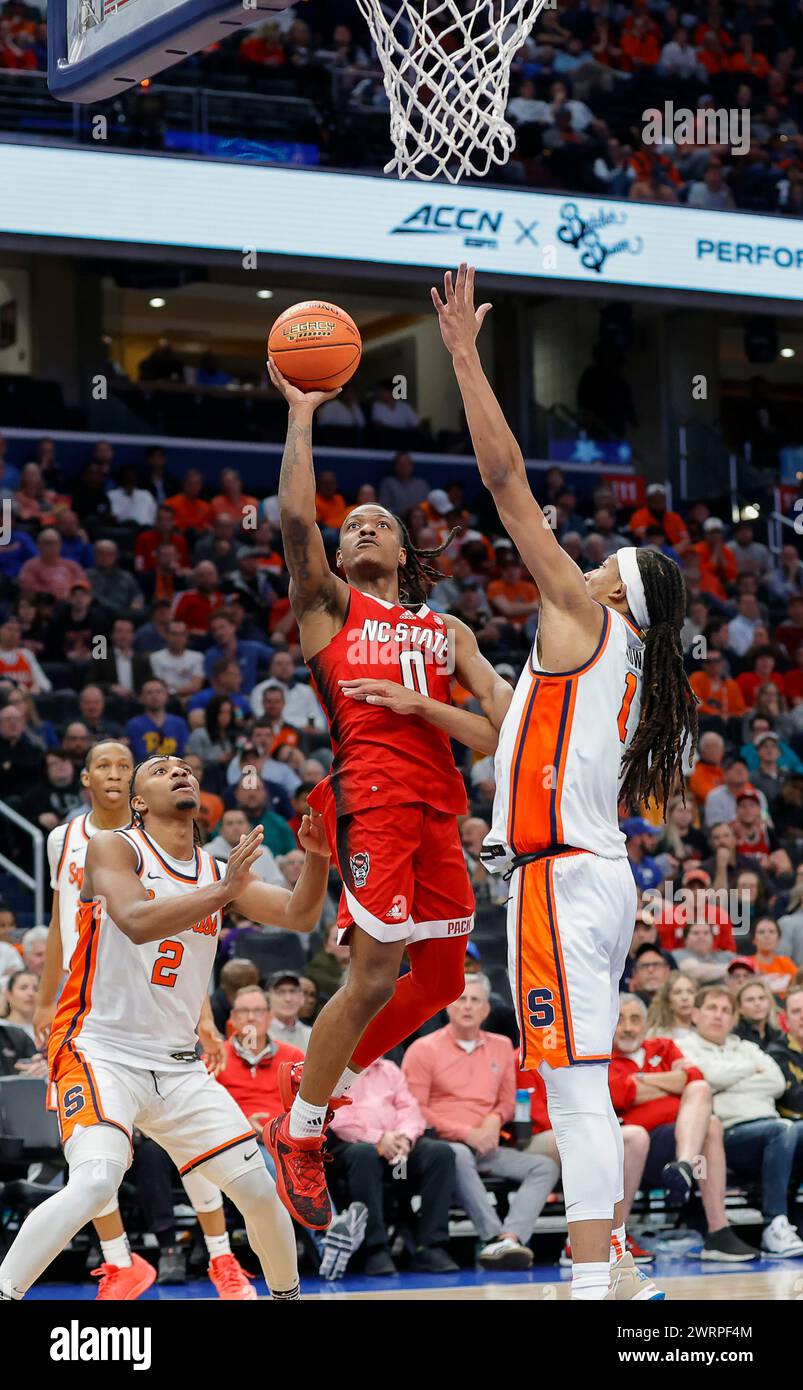 March 13, 2024: NC State Wolfpack Guard (0) DJ Horne takes a shot ...
