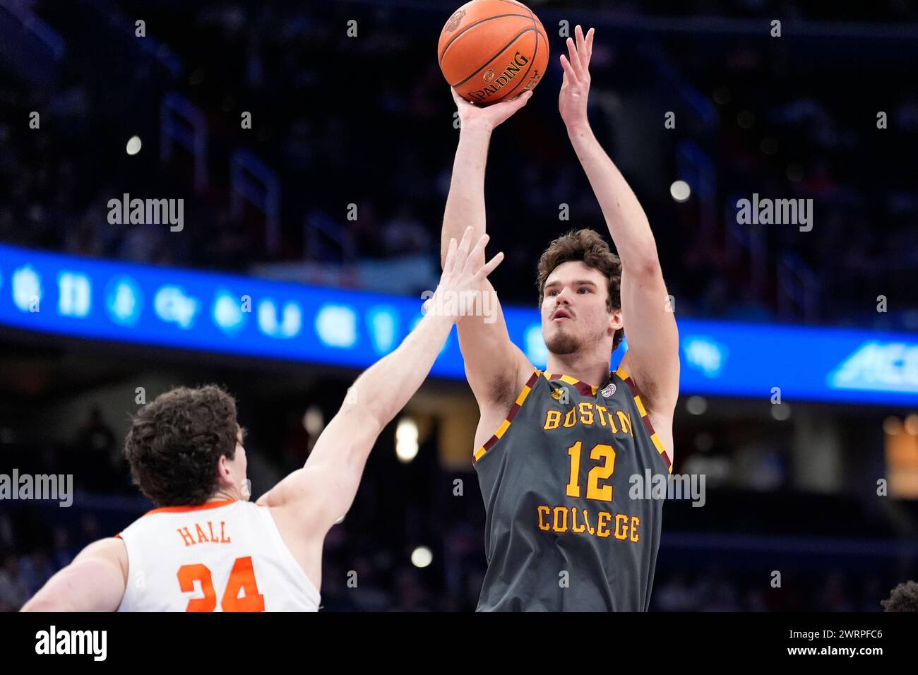 Boston College forward Quinten Post (12) shoots over Clemson center PJ ...