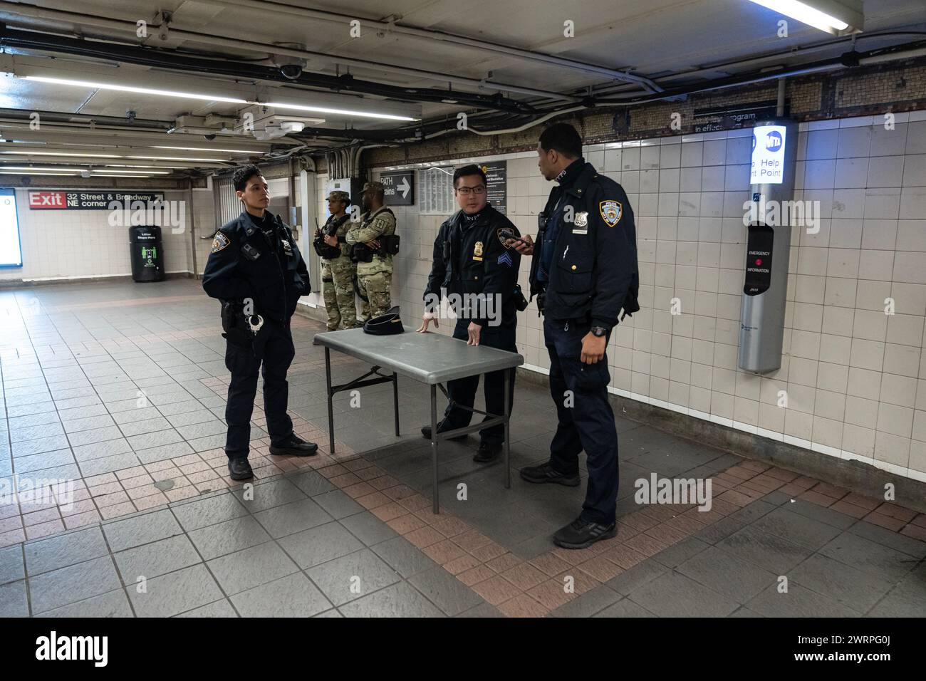 NYPD officers with help members of National Guards deployed to inspect ...