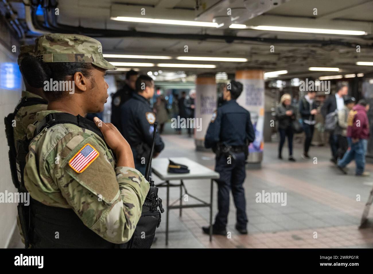 NYPD officers with help members of National Guards deployed to inspect ...
