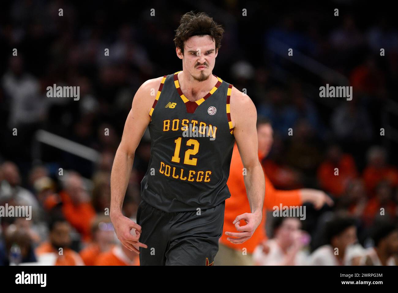 Boston College forward Quinten Post (12) reacts after making a three ...