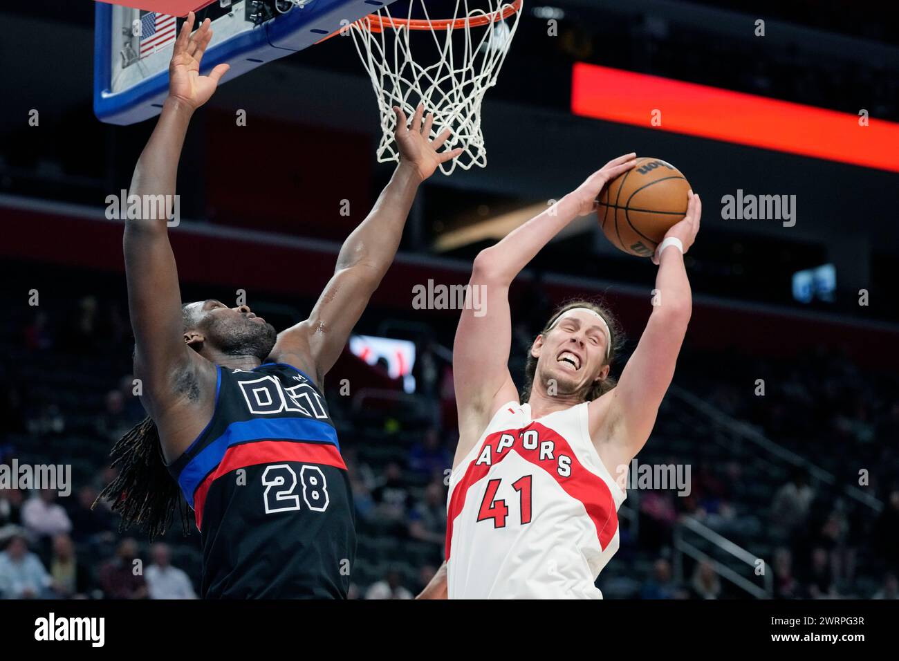 Toronto Raptors forward Kelly Olynyk (41) pulls down a rebound next to ...