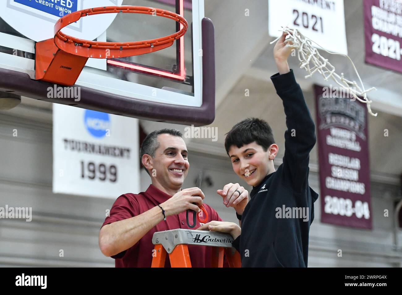 Colgate coach Matt Langel, left, celebrates with his son Jackson, who ...