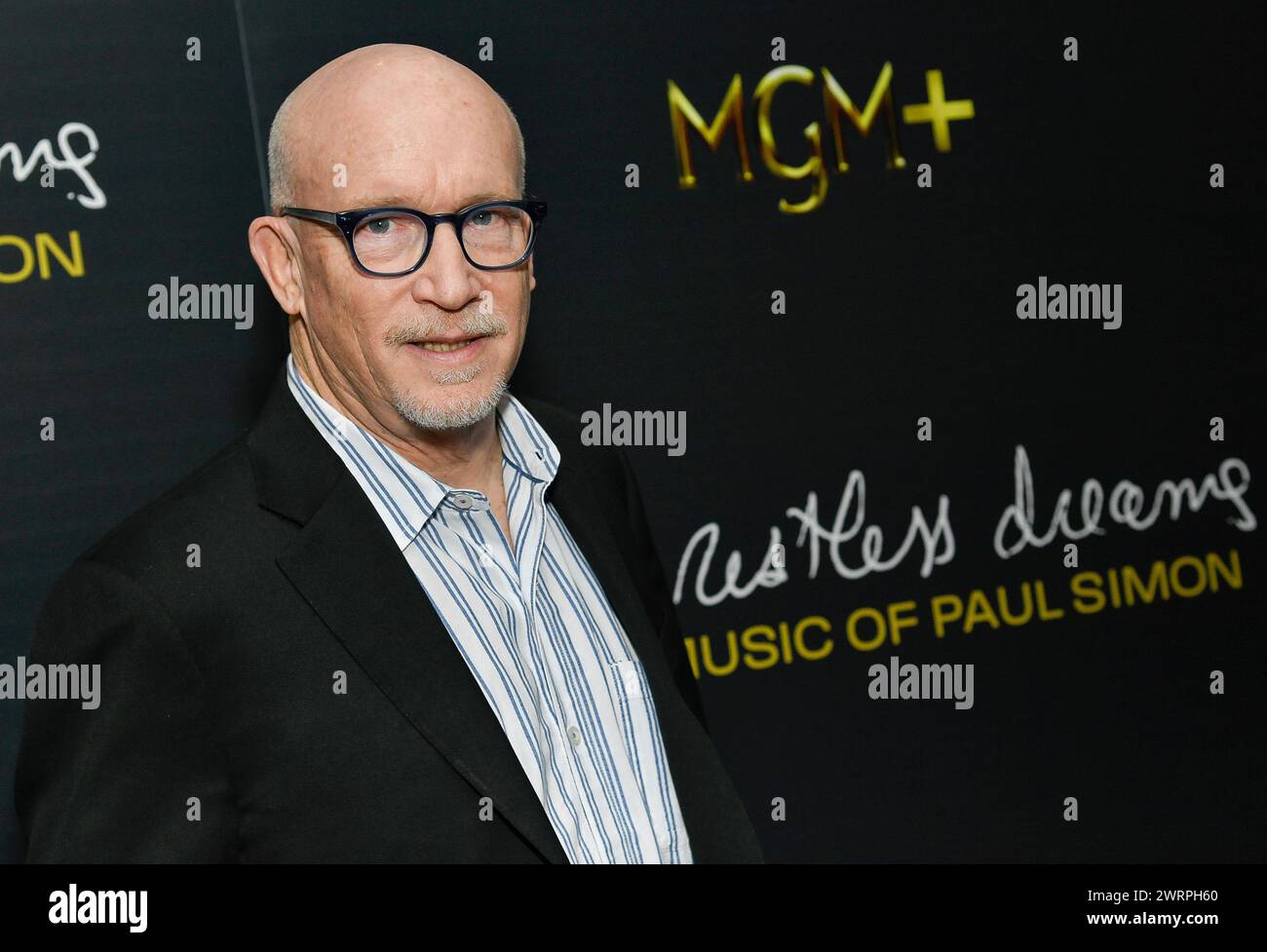 Alex Gibney attends the MGM+ premiere of "In Restless Dreams: The Music ...