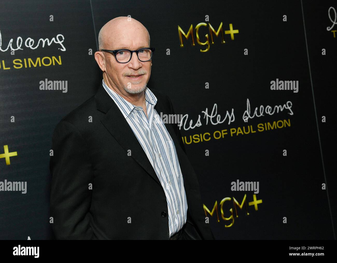 Alex Gibney attends the MGM+ premiere of "In Restless Dreams: The Music ...