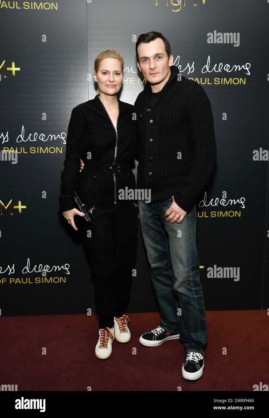 Aimee Mullins, left, and Rupert Friend attend the MGM+ premiere of "In ...