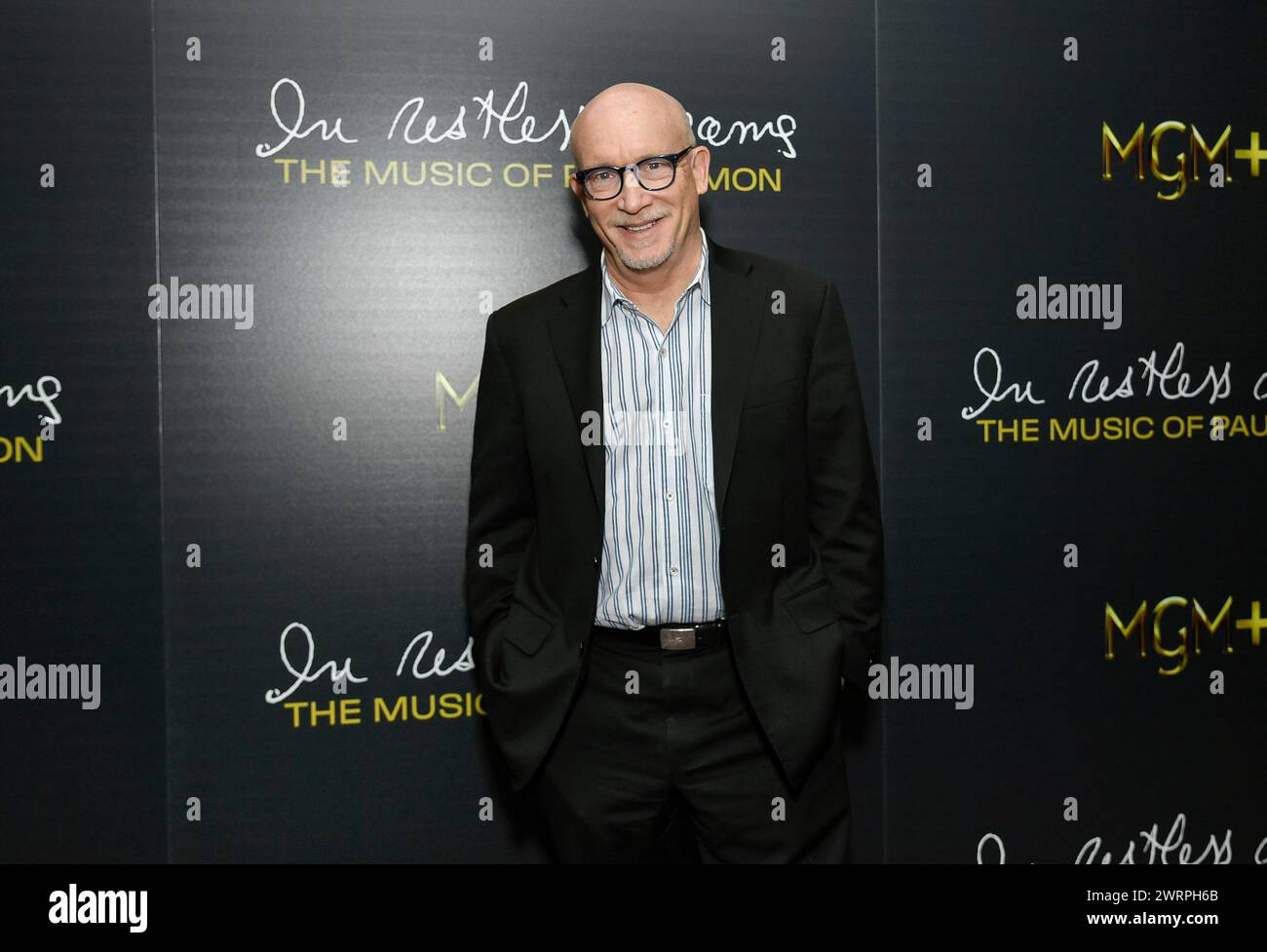 Alex Gibney attends the MGM+ premiere of "In Restless Dreams: The Music ...