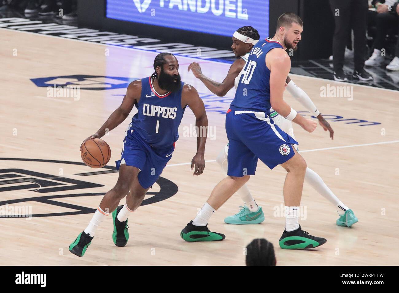 LOS ANGELES, CA - MARCH 12: LA Clippers guard James Harden (1) goes ...