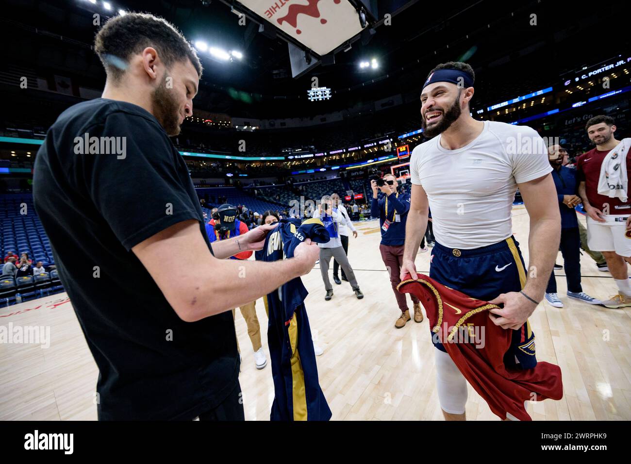 Cleveland Cavaliers forward Pete Nance, left, trades jerseys with his ...