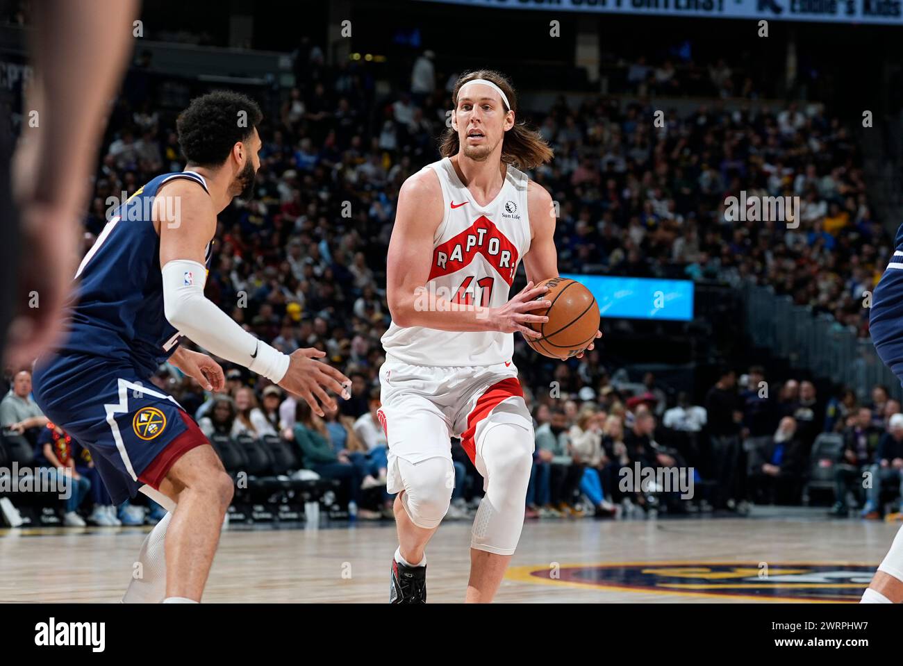 Toronto Raptors forward Kelly Olynyk (41) and Denver Nuggets guard ...