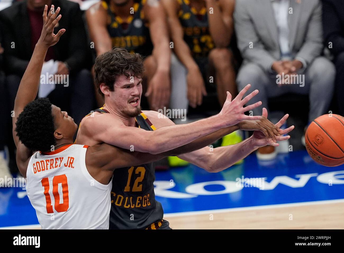Boston College forward Quinten Post (12) loses the ball while going up ...