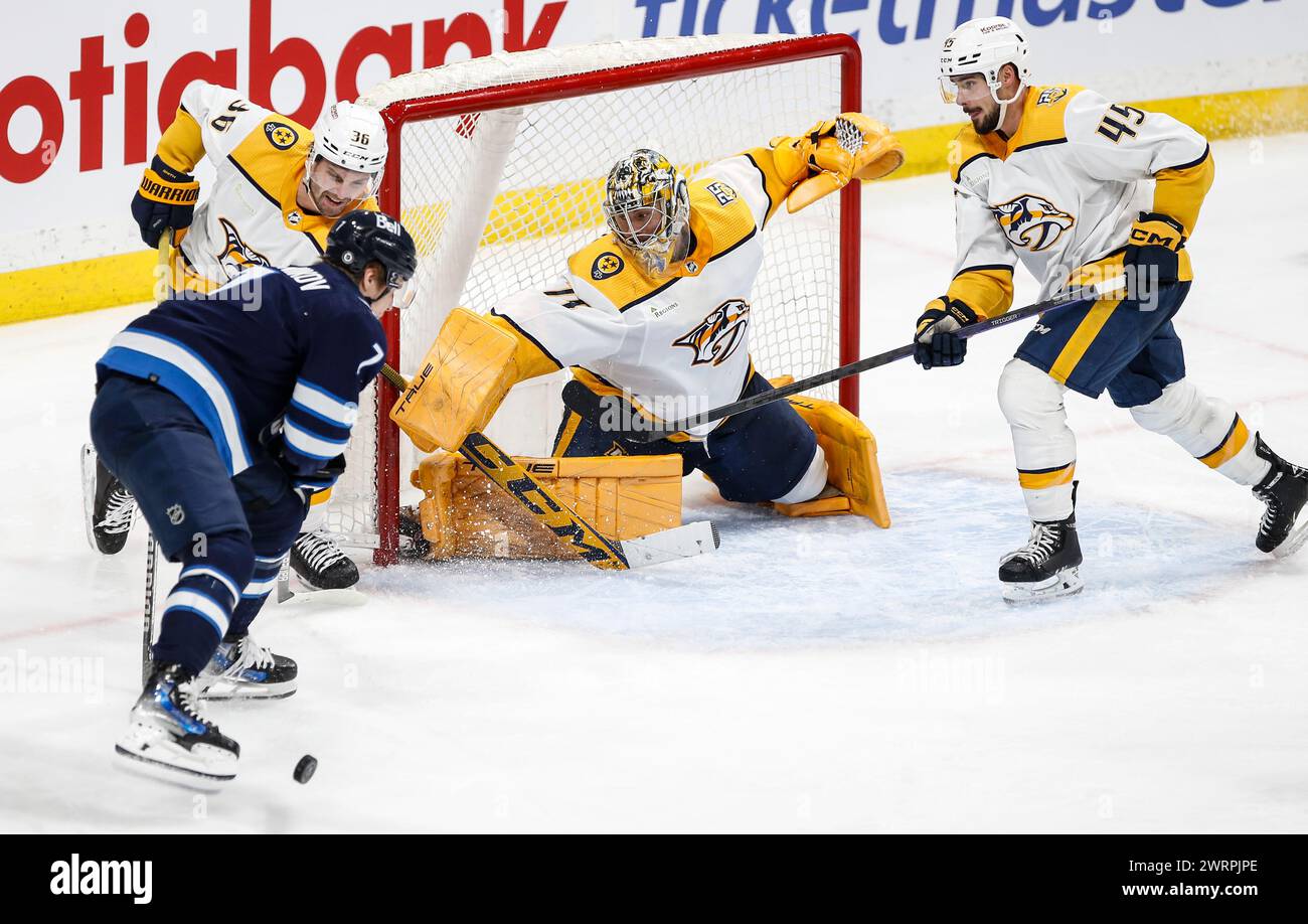 Nashville Predators goaltender Juuse Saros (74) saves the shot as Cole ...