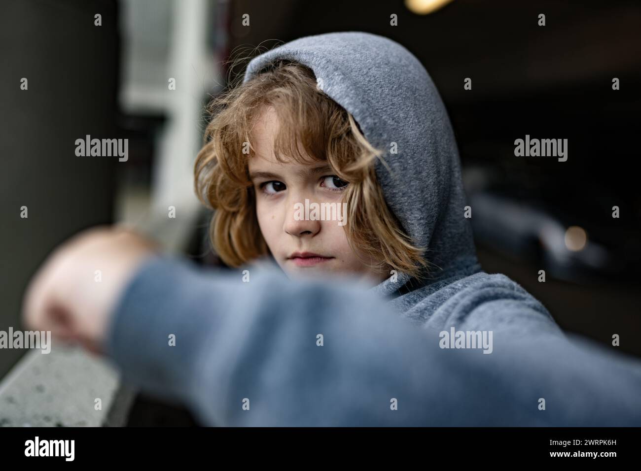 Aggressive anger child. Little kid boy anger on street. Angry little ...