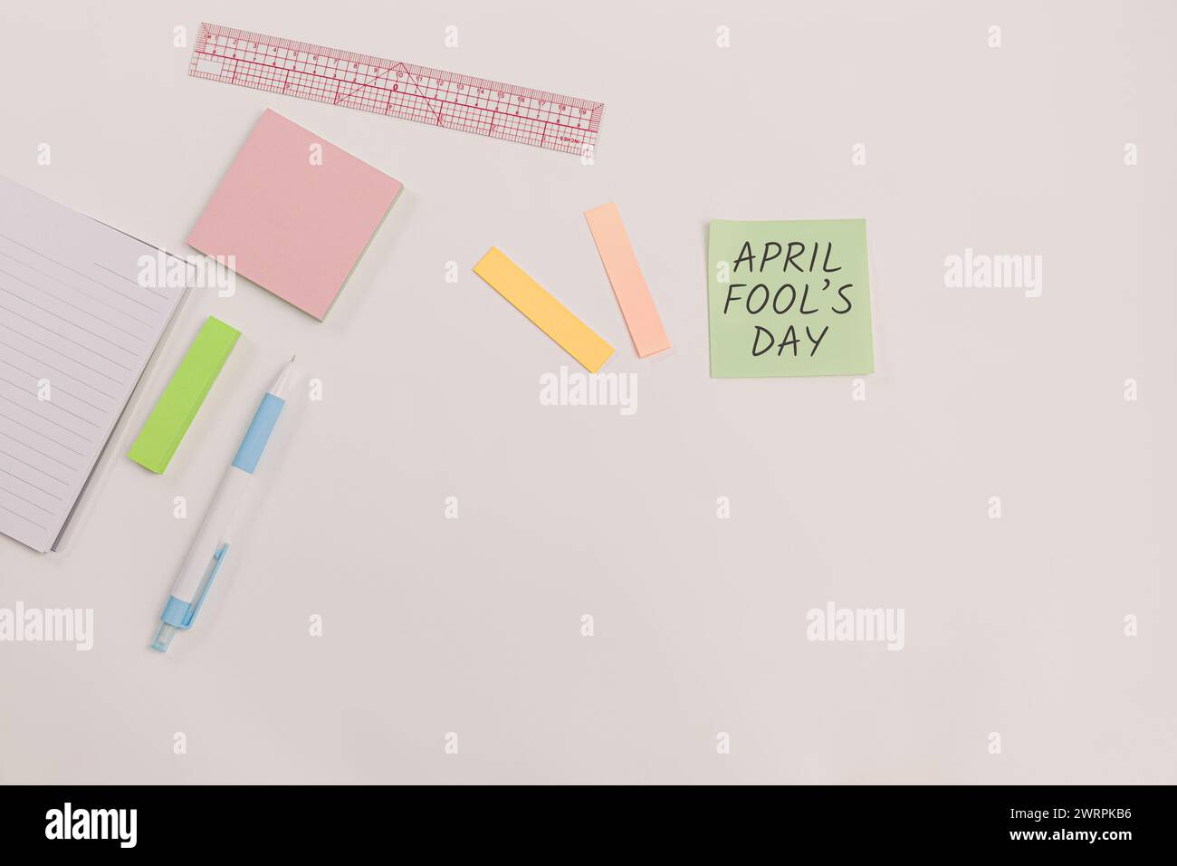 Concept of office on April fool's day with stationery tools on the ...