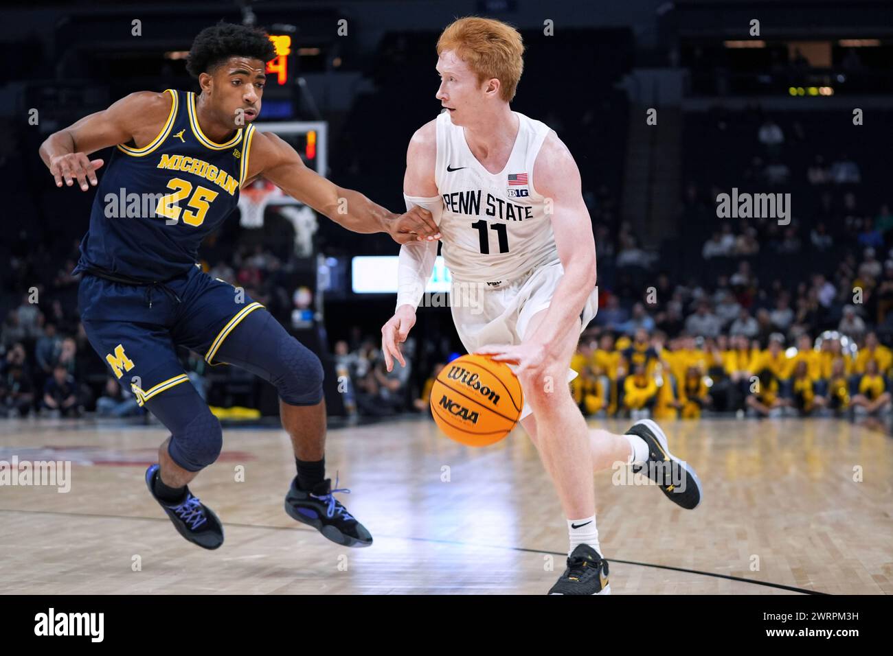 Penn State forward Leo O'Boyle (11) works toward the basket as Michigan ...