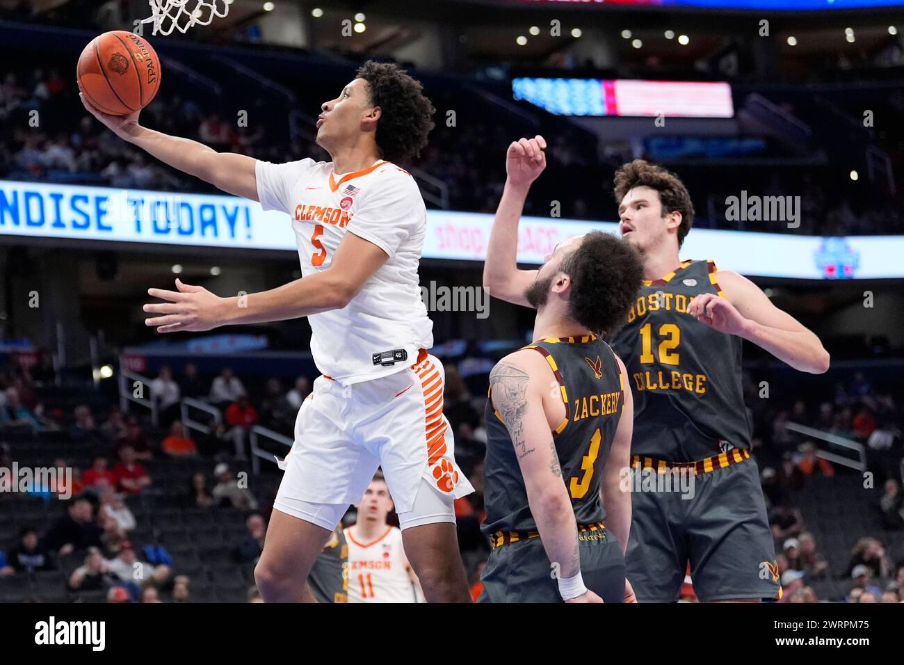 Clemson forward Jack Clark (5) shooting against Boston College guard ...