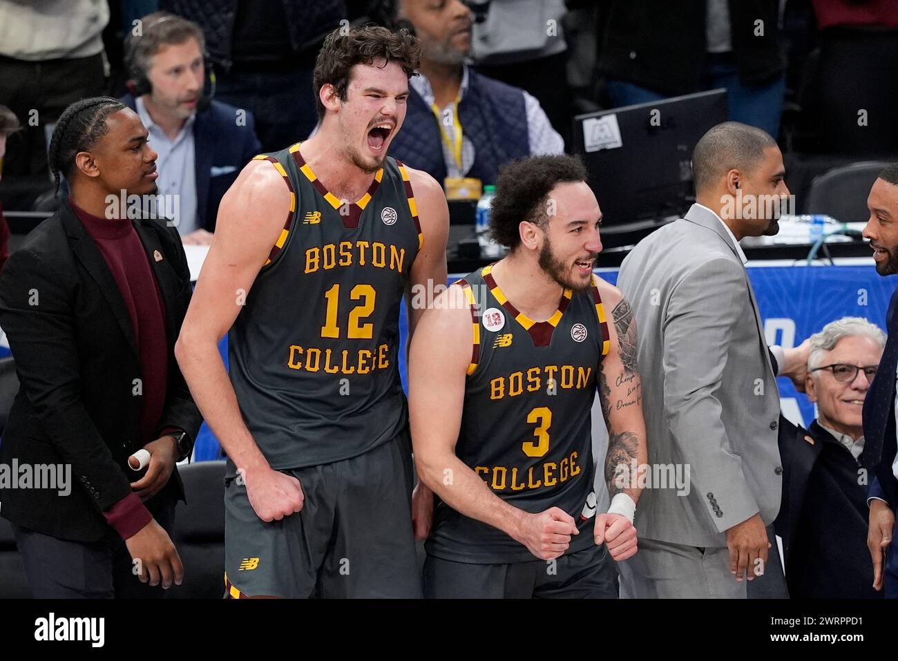 Boston College forward Quinten Post (12) and guard Jaeden Zackery (3 ...