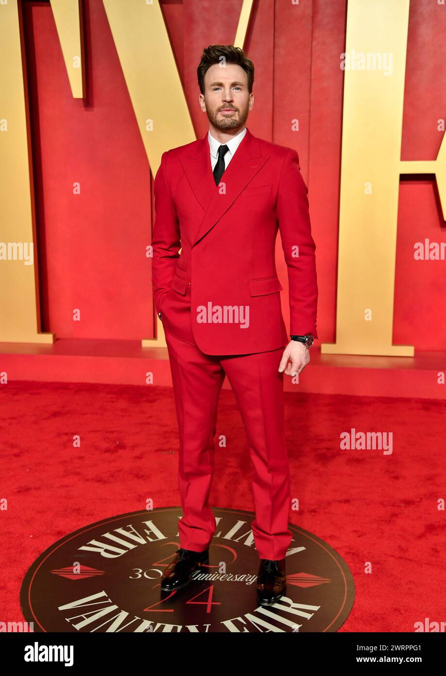 Chris Evans arrives at the Vanity Fair Oscar Party on Sunday, March 10 ...