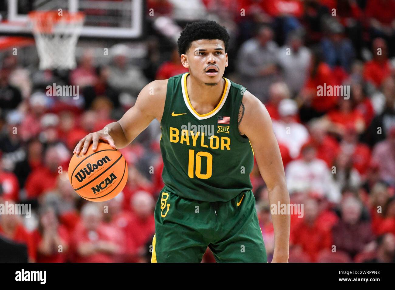 Baylor guard RayJ Dennis (10) brings the ball up court against Texas ...