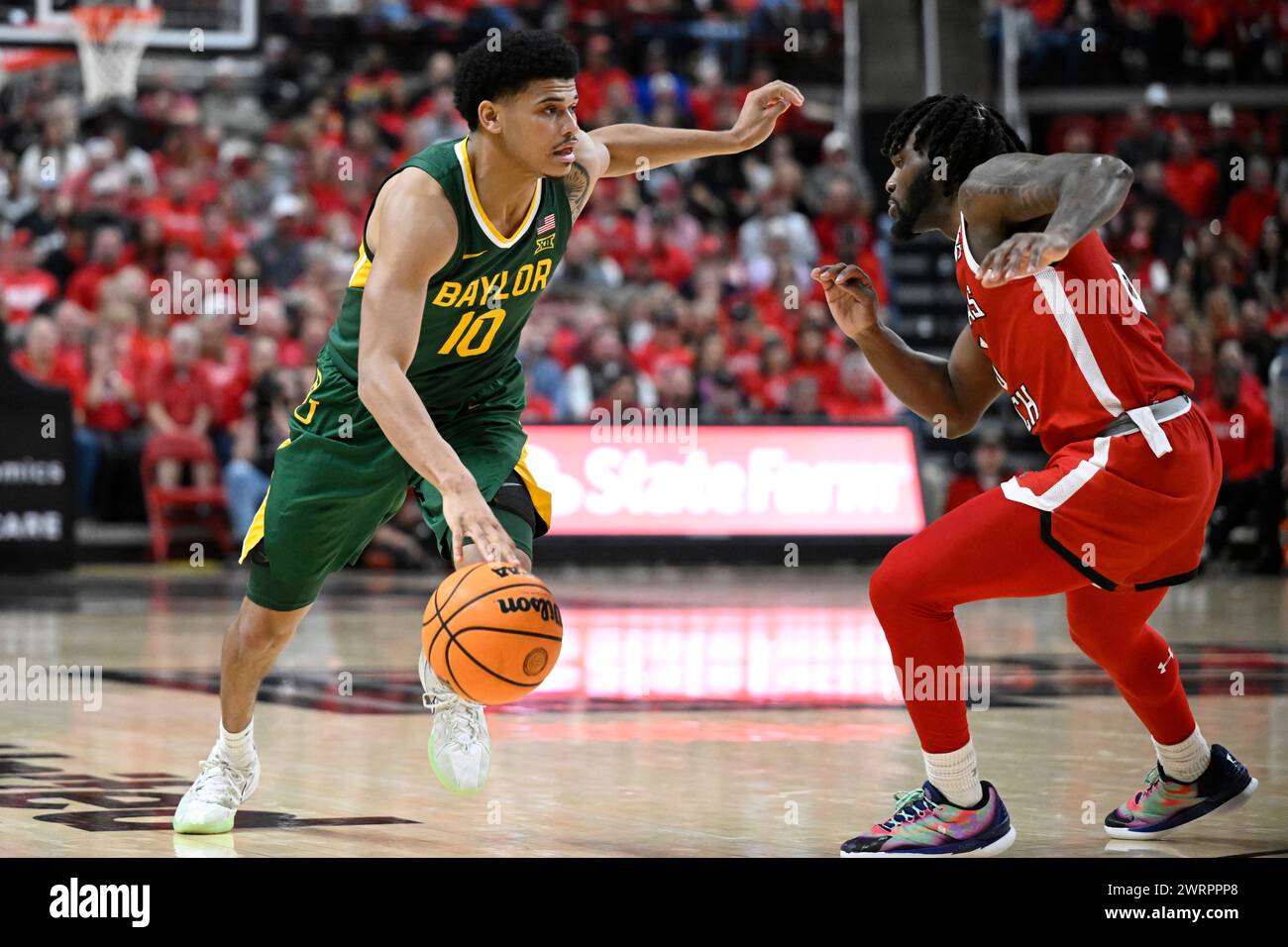Baylor guard RayJ Dennis (10) drives to the basket against Texas Tech ...