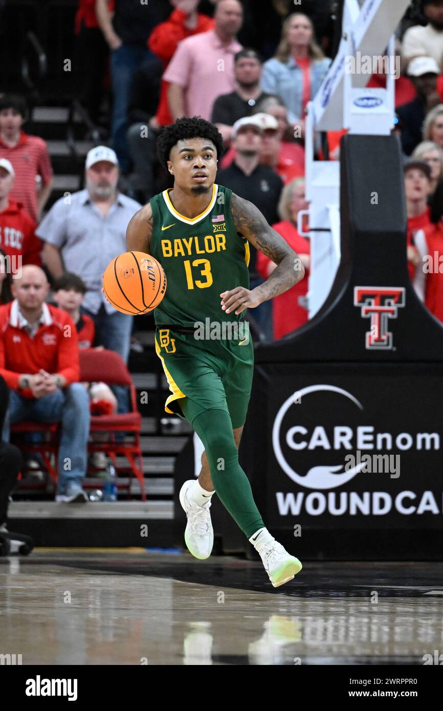 Baylor guard Langston Love (13) brings the ball up court against Texas ...