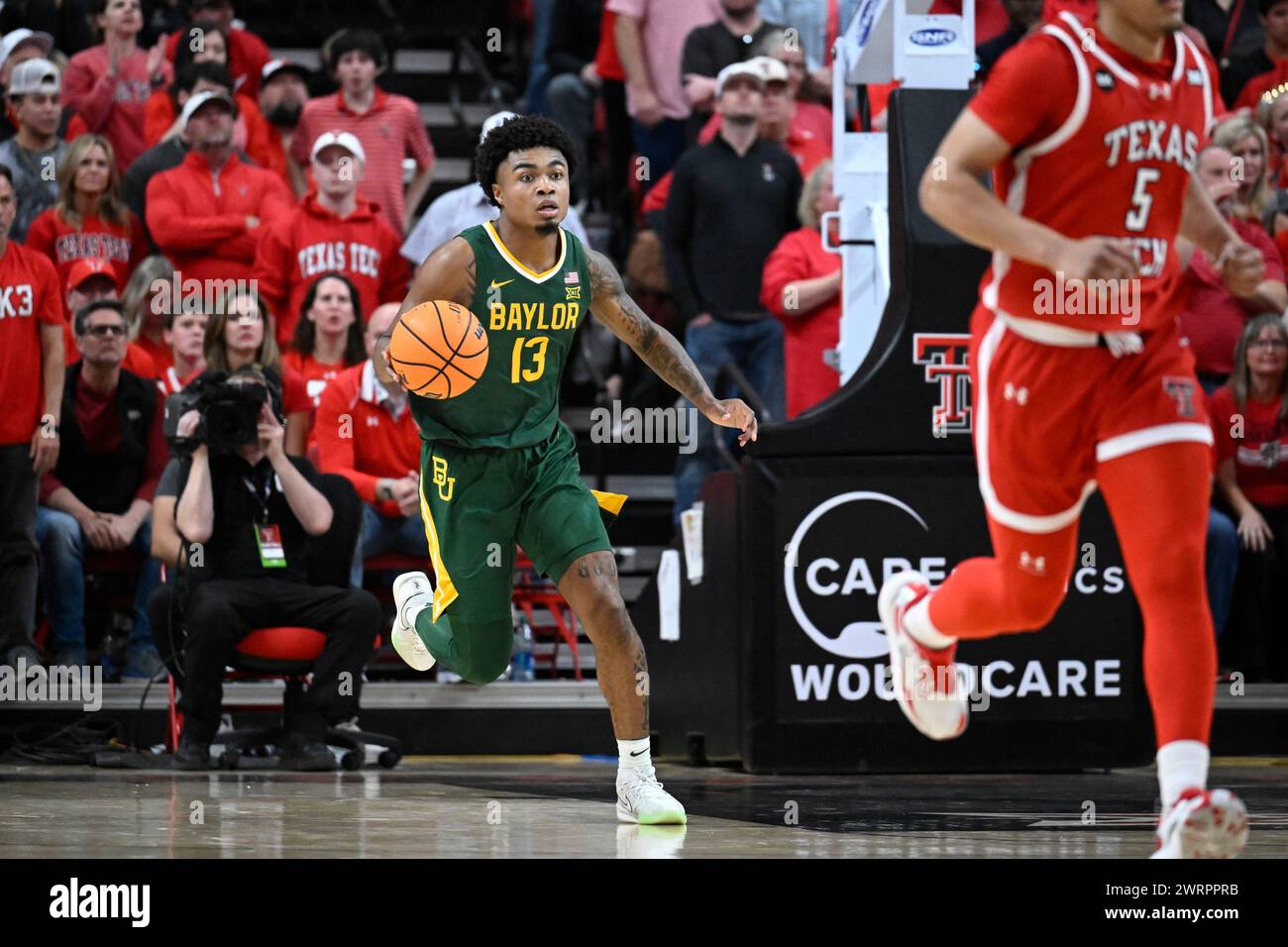 Baylor guard Langston Love (13) brings the ball up court against Texas ...
