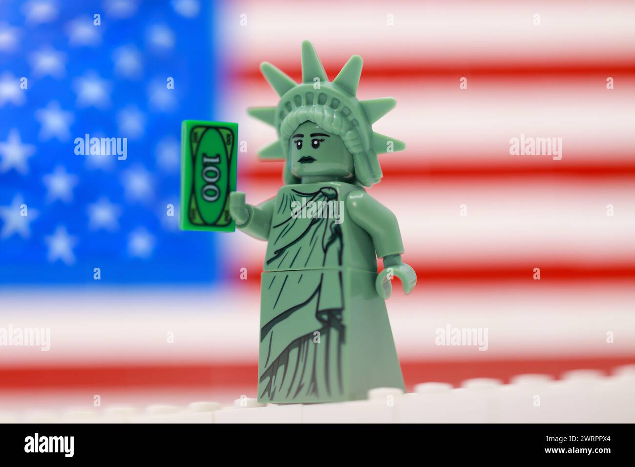 the citizen dress like Statue of Liberty hold the dollar under the US ...