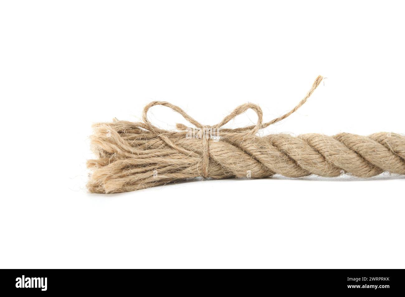 A close-up image of a coiled rope on a white background, with the ends ...