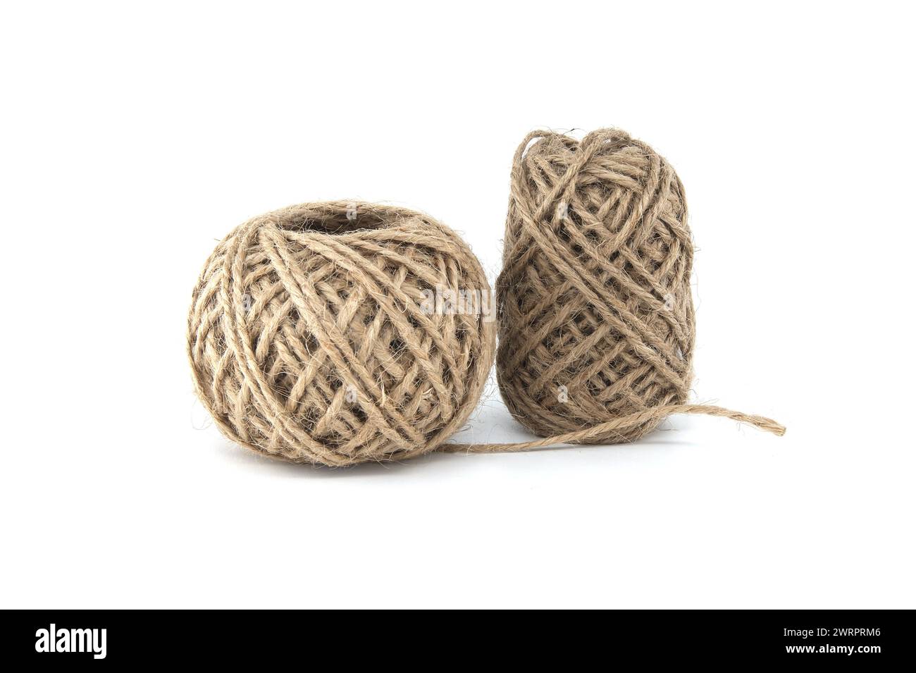 Spools of jute twine made from natural jute materials, each varying in ...