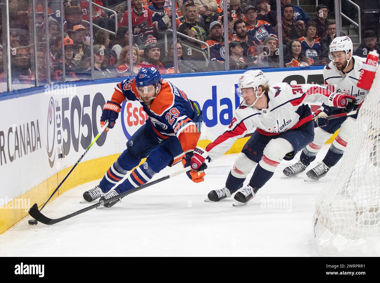 Washington Capitals' Rasmus Sandin (38) and Edmonton Oilers' Leon ...