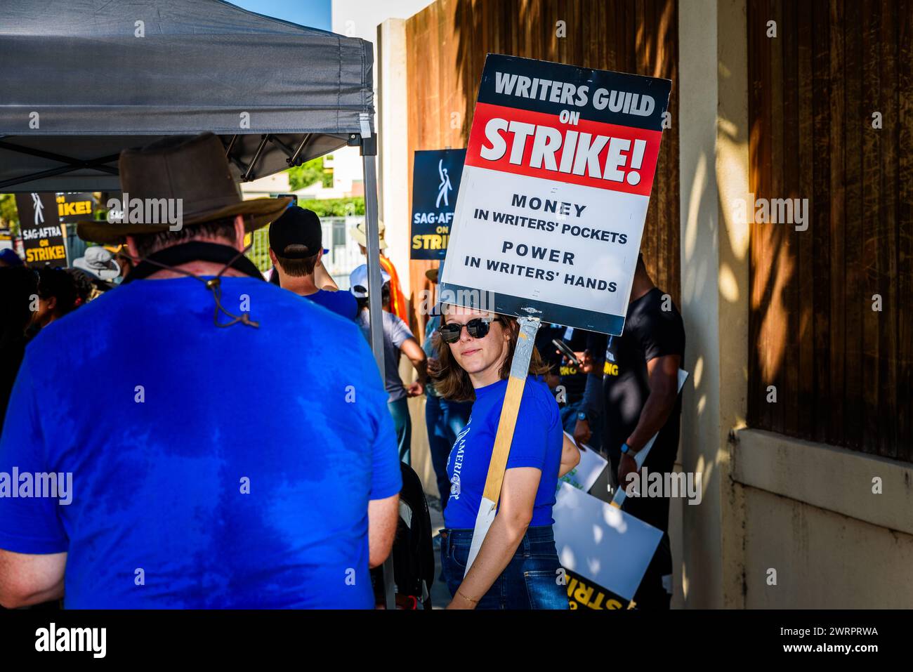 A writer w/ picket sign up on July 14, 2023, Hollywood actors and ...