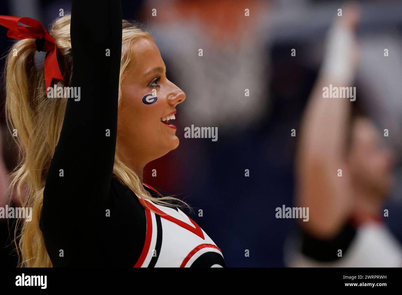 NASHVILLE, TN - MARCH 13: A Georgia Bulldogs cheerleader wears a G ...