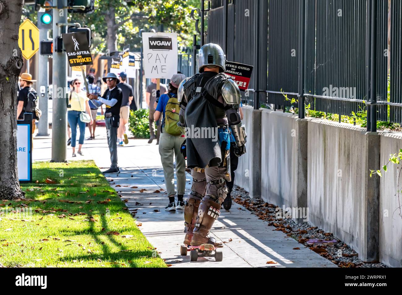 An actor, Tim Brehmer dressed as the Star Wars character, Mandalorian ...