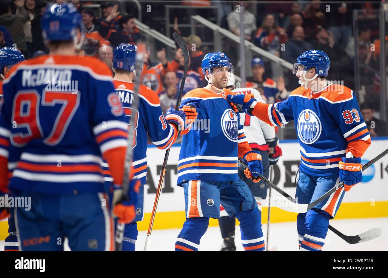 Edmonton Oilers' Connor McDavid (97), Zach Hyman (18), Evan Bouchard (2 ...