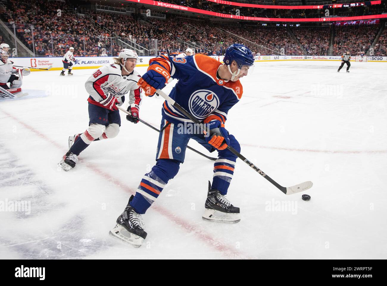 Washington Capitals' Rasmus Sandin (38) chases Edmonton Oilers' Ryan ...