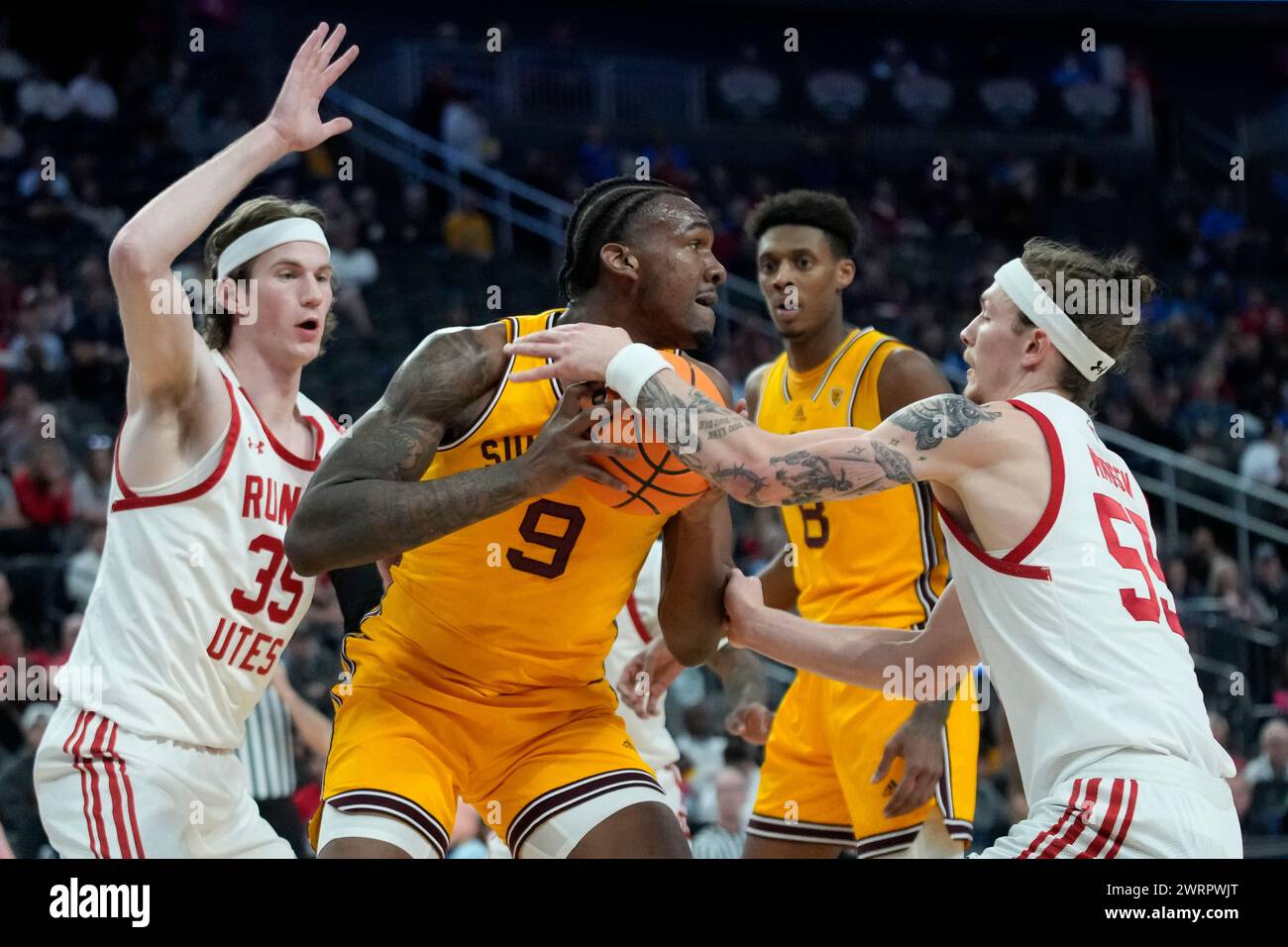 Utah guard Gabe Madsen (55) fouls Arizona State center Shawn Phillips ...