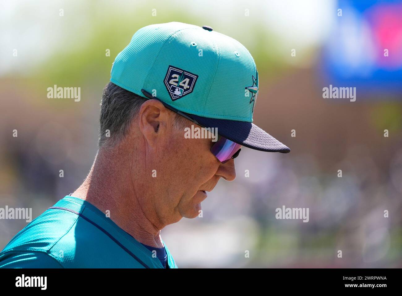 Seattle Mariners manager Scott Servais walks to the dugout during prior ...
