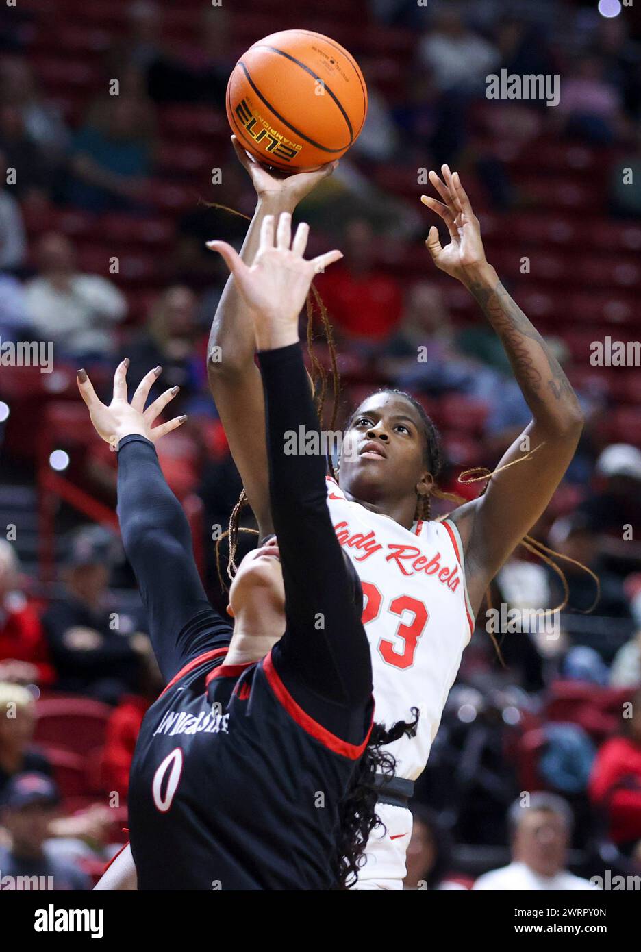 UNLV center Desi-Rae Young (23) shoots over San Diego State guard ...